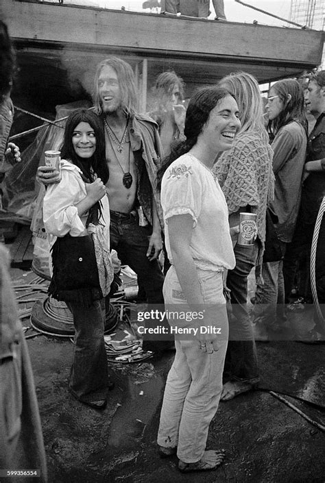 Hippies Smile And Socialize During The Free Woodstock Music And Art