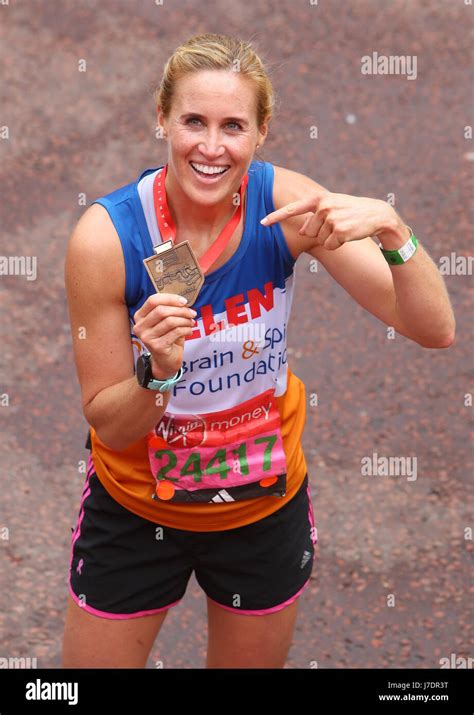 British Professional Rower Helen Glover Holds Up Her Medal At The