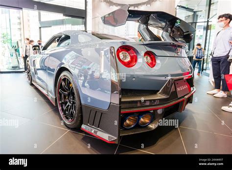A Gt R Nismo Car On Display In The Nissan Showroom At The Ginza Place Building Low Angle Rear