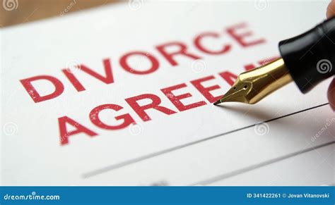 Divorce Agreement Document With Fountain Pen On Table Surface Royalty
