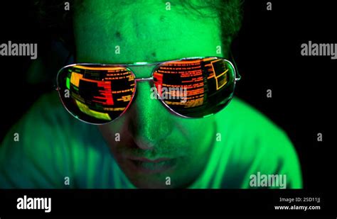 Hackers Glasses Reflecting Malicious Code On Screen Stock Video