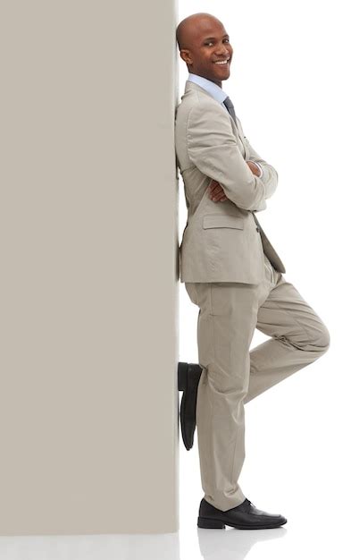 Premium Photo Happy Businessman Portrait And Leaning On Wall With Arm