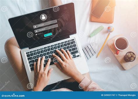 Person Hand Typing On Keyboard With Login And Password On Screen Display Stock Image Image Of