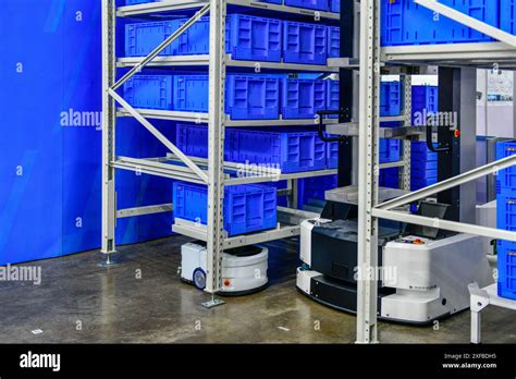 Autonomous Robot Transportation In Warehouses Automation Robots In Storage Hangar Agv For