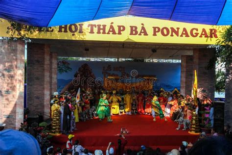 People In Colorful Costumes Performing At The Po Cham Festival In At