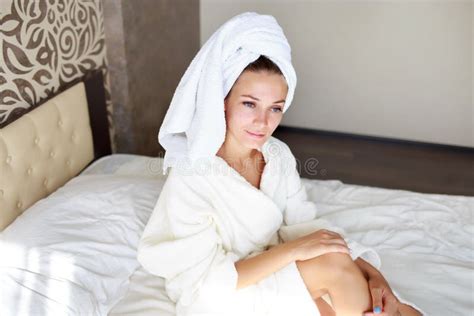Beautiful Brunette Girl With A Towel On Her Head In Bed She Was Taking