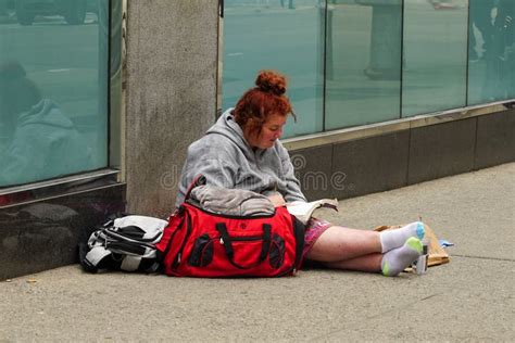 Homeless Woman Near Rockefeller Center In Midtown Manhattan Editorial