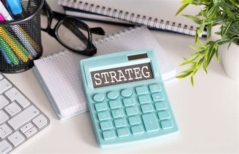 Strategy Text On The Calculator Display Next To A Sticker For Writing