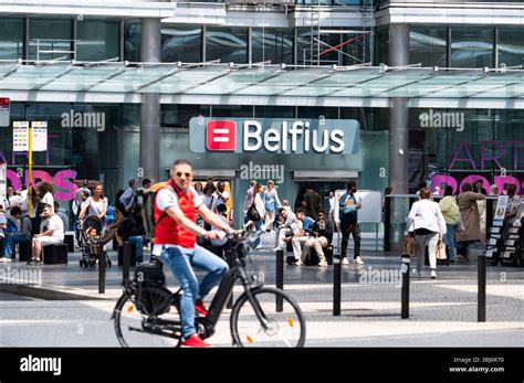 Pedestrians At The Belfius Tower Rogier Square In Saint Josse Brussels Belgium 12 June 2025