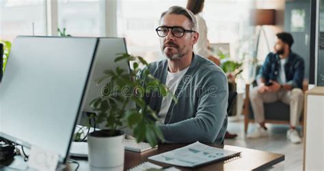 Computer Glasses And Web Development With Man Software Engineer In Office For Coding Or