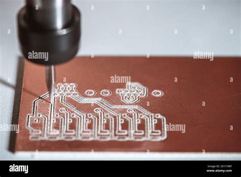 Machine With Numerical Control Cnc Carries Out Milling Of Printed Circuit Boards Circuit