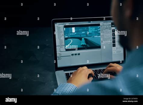 man game software engineering coding on main screen of unity engine on