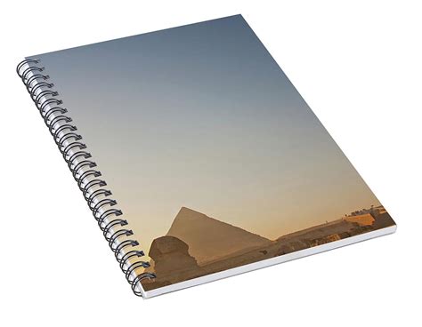 the giza pyramids and sphinx at sunset spiral notebook by matt champlin