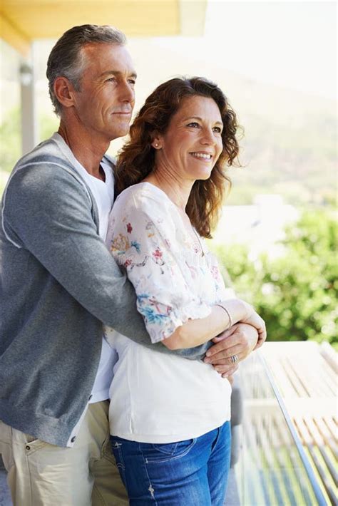 Mature Couple And Happy Outside In Hug Together Vacation And Romance
