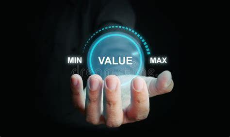 Business Value Added Concept A Man Holds A Virtual Icon Of Increasing