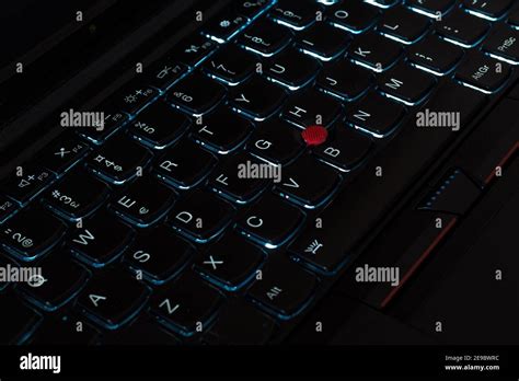 White Blue Backlit Low Profile Laptop Keyboard Indoors Shot Stock Photo Alamy