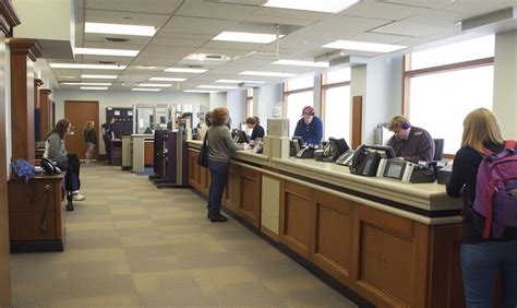 Premium Photo Bank Photos Featuring Customers At Teller Counters