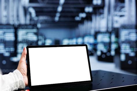 Premium Photo Technician Using Tablet In Data Center