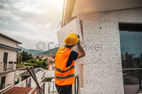 Polystyrene Thermal Cladding For Energy Saving On A Construction Site Stock Photo 5105908