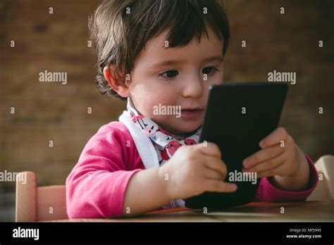 Baby Watching Phone Hi Res Stock Photography And Images Alamy