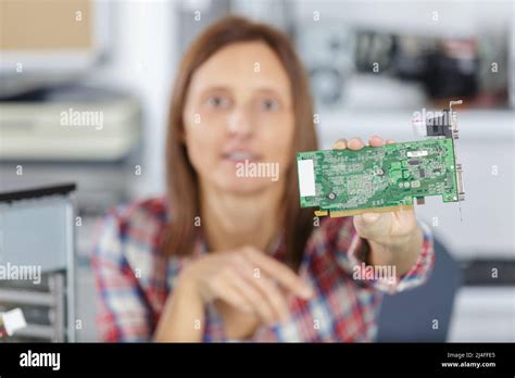 Female Worker Showing A Hard Drive Stock Photo Alamy