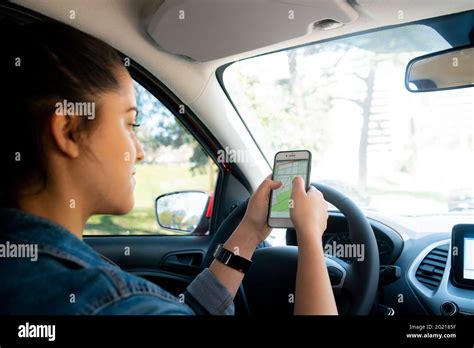 Woman Using Gps Navigation System Stock Photo Alamy