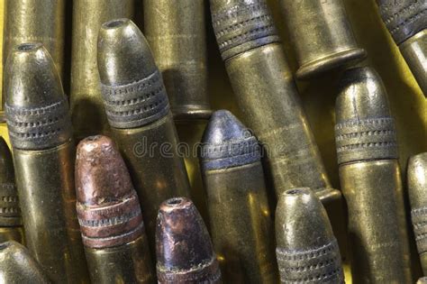 Various Bullets On A Yellow Background Stock Photo Image Of Miniature Close 357337334
