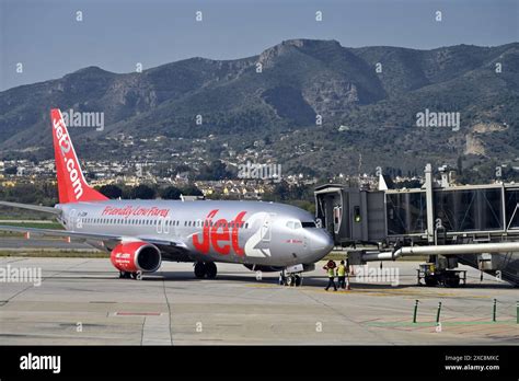 Jet2 Airplane With Passenger Boarding Bridge Being Moved Into Place