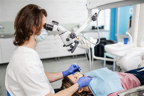 A Woman Has An Annual Dental Check Up In Dentist Surgery Photo