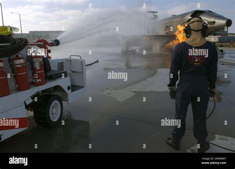 Us Navy Members Of The Training Staff Demonstrate Effective