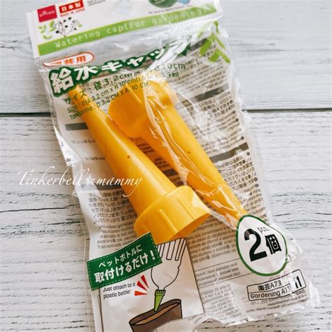 ダイソーで見つけた留守の間の給水キャップ いつも心にハワイなの～♡
