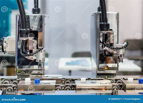 Automatic Robot Arm With Optical Sensor Working In Factory Stock Image