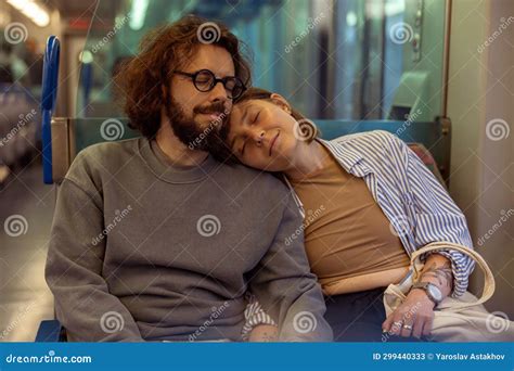 Young Tired Tourist Couple With Closed Eyes Is Travel Together While