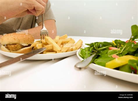 Man Eating Burger Chips Hi Res Stock Photography And Images Alamy