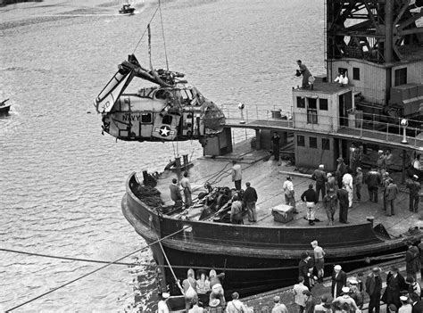 Us Navy Helicopter Being Pulled From Lyttelton After Crashing By The