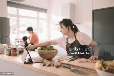 Asian Cooking Mother Photos And Premium High Res Pictures Getty Images