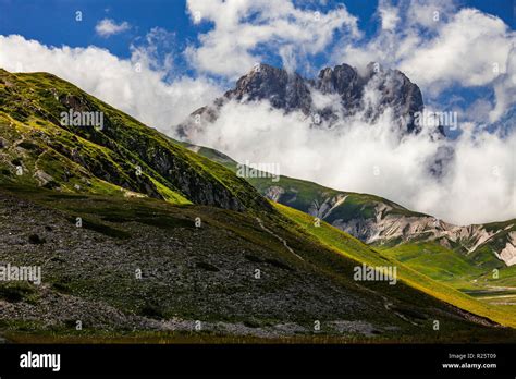 The Corno Grande Peak Of The Apennines Stands Out Among The Clouds