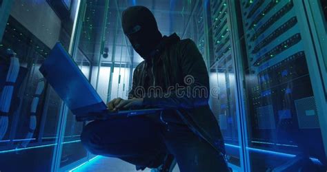 anonymous hacker breaking into server system stock image image of