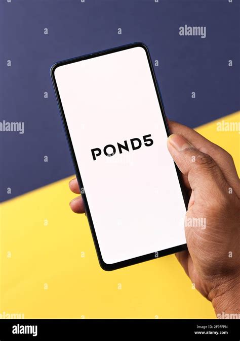 Assam India April 19 2021 Pond5 Logo On Phone Screen Stock Image