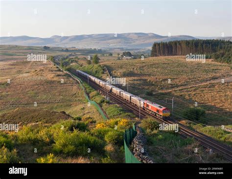 Db Cargo Class 66 Locomotive On The West Coast Main Line In Cumbria At Shap With A Freight Train