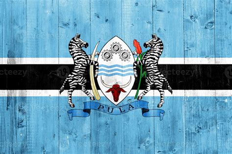 Flag And Coat Of Arms Of Republic Of Botswana On A Textured Background
