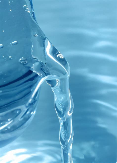 A Close Up Of A Water Pitcher Pouring Water Into A Pool Seaart Ai