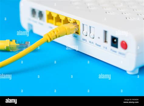Internet Modem Router Hub With Cable Connecting On Blue Background Stock Photo Alamy
