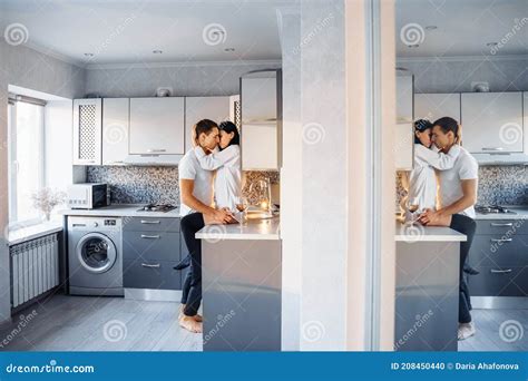 Reflection In Glass In A Mirror Hot Couple In Love Man And Woman Slowly Undress Each Other