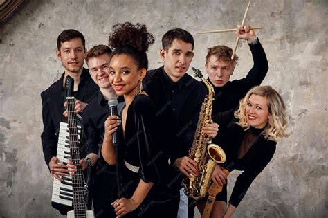 Portrait Of Diverse Group Of Young People Musical Band Playing With