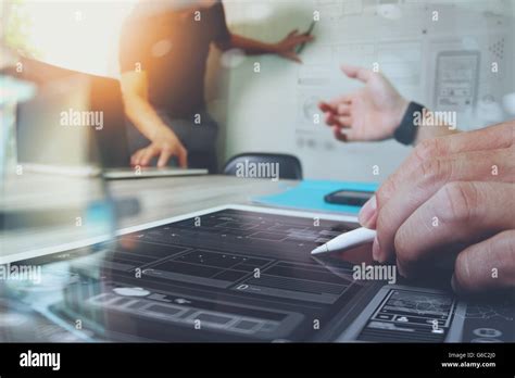 Businessman Making Presentation With His Colleagues And Business