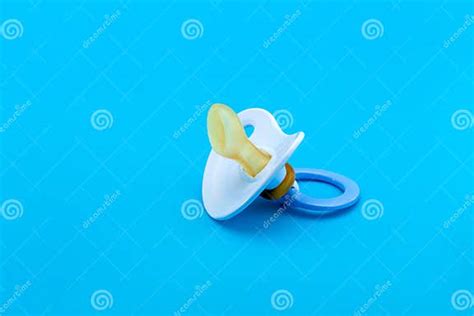 A Blue Pacifier Made Of Soft Silicone Stock Image Image Of Chewing