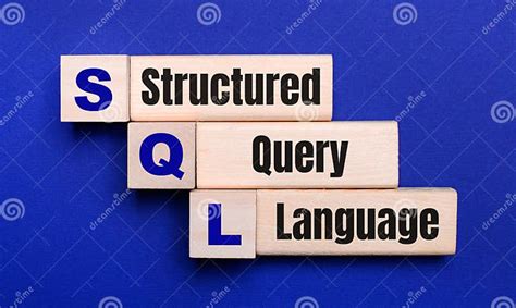 On A Bright Blue Background Light Wooden Blocks And Cubes With The