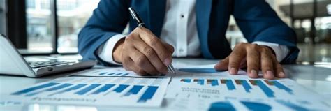 Premium Photo Businessperson Analyzing Financial Charts