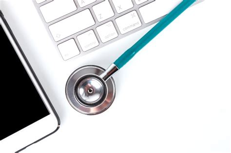 Premium Photo Stethoscope And Computer Keyboard On White Background